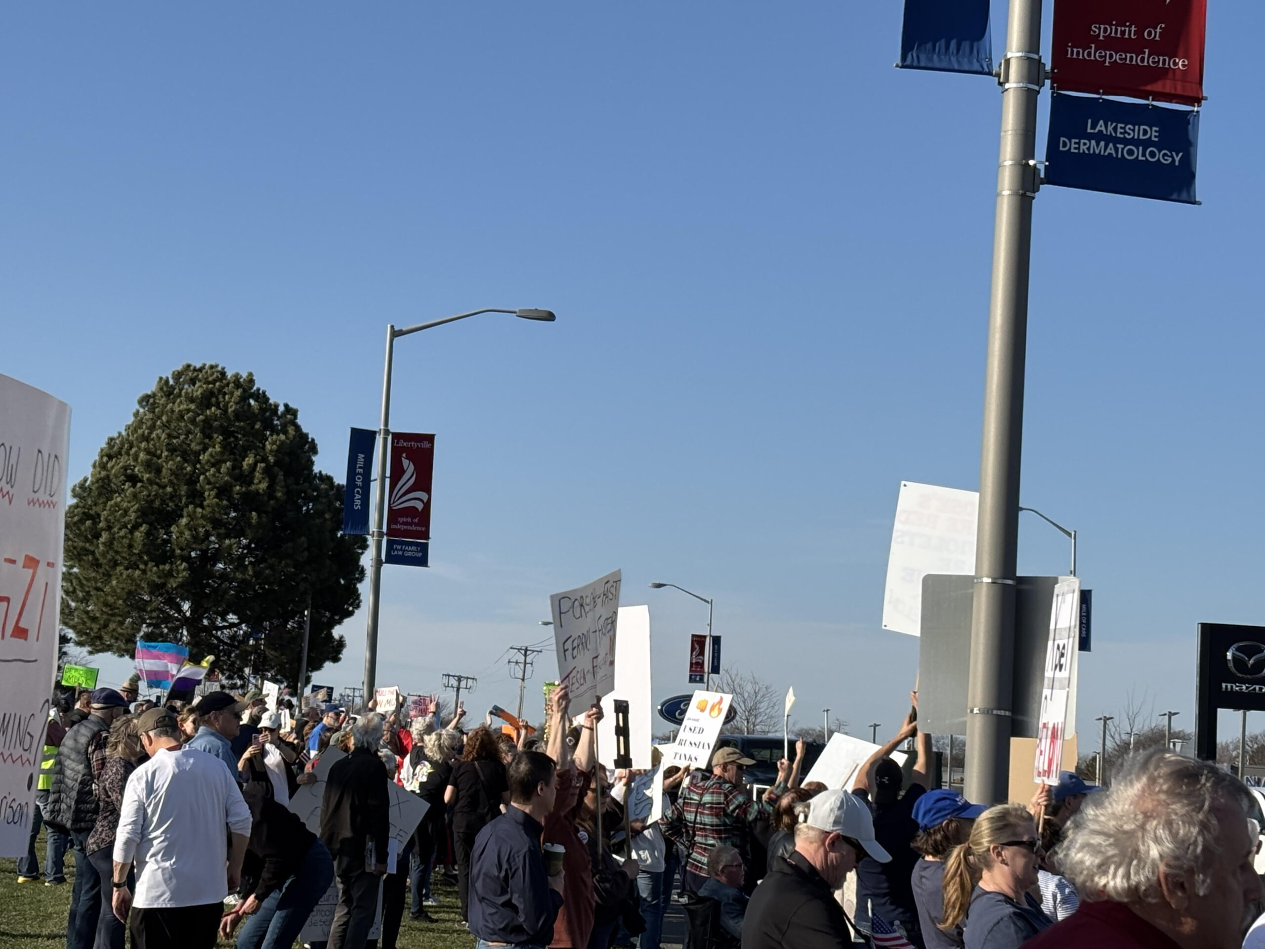 Not Backing Down: More Than 300 Come Out To Protest Elon Musk And ...